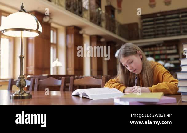 Elementary student writing in notebook Stock Videos & Footage - HD and 4K Video Clips - Alamy
