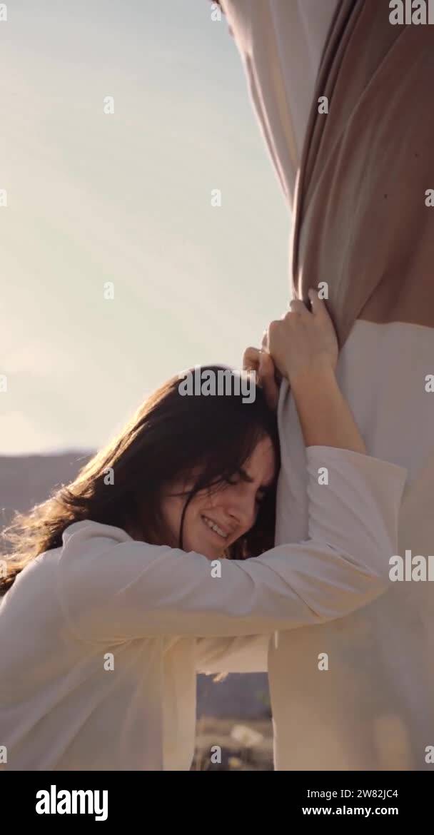 Mary mourns the death of Jesus at his feet. Jesus is crucified on the cross Stock Video Footage ...