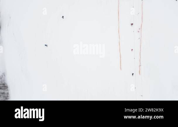 Panoramic top view from drone on cable way in ski resort. Ski lift ...