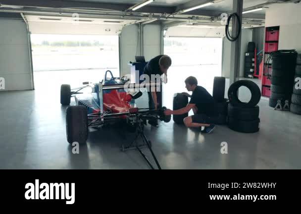 Fixing a race car Stock Videos & Footage - HD and 4K Video Clips - Alamy