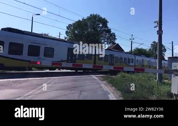 Railroad Level crossing signals, Warning flashing red lights behind ...