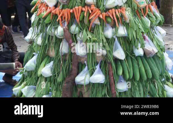 Tumpeng sayur (vegetable cone) at the ceremony of sedekah bumi ...