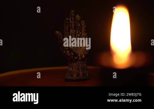 Fortune teller hand or palmistry on the witch table. Palmistry with ...