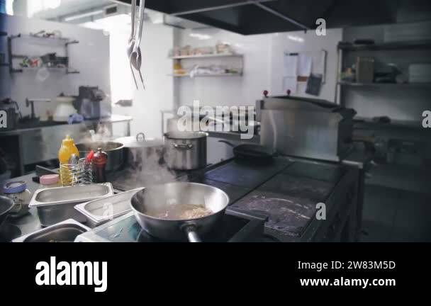 cooking. steaming food. buffet restaurant kitchen. Close-up. food is ...