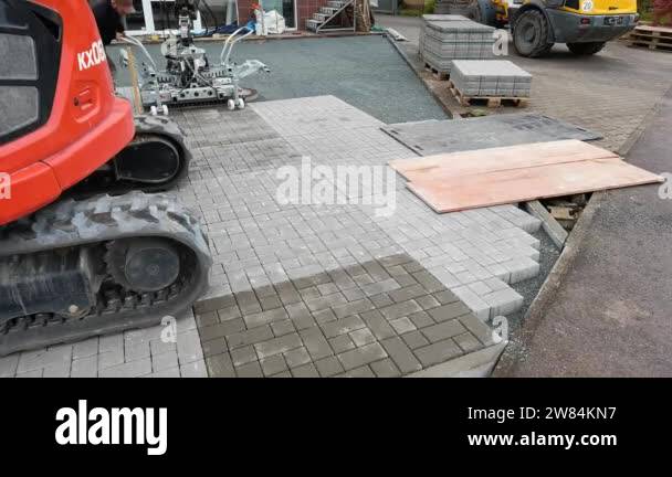 Paving slabs laying.construction technologies. Construction and ...