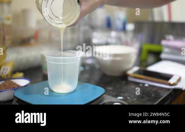 Measure milk Stock Videos & Footage - HD and 4K Video Clips - Alamy