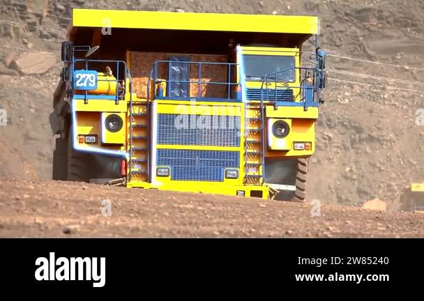 The modern quarry truck drives through the quarry. Visualization of the ...