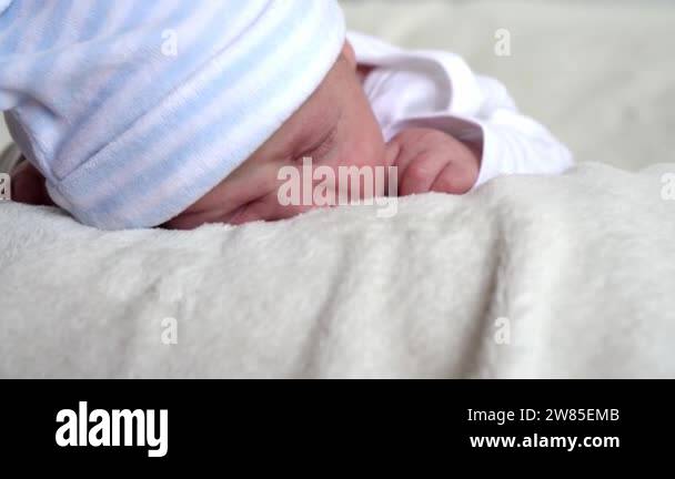 Close-up Newborn Baby Face Portrait Early Days Sleeping Sweetly On ...
