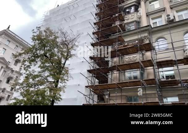 Facade restoration of residential building. Reconstruction of house in ...