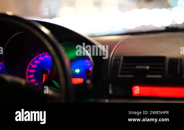 Car is waiting for the traffic light signal, the turn indicator arrow ...