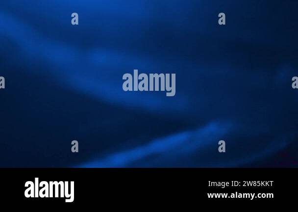 waving crumpled plastic texture with a blue neon light texture ...