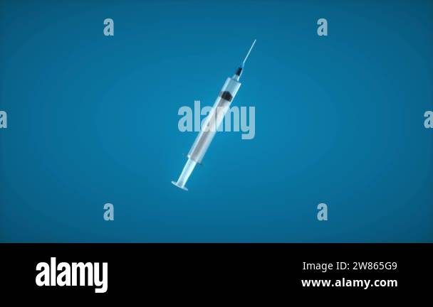 The syringe, partially filled with medication, rotates around its axis ...