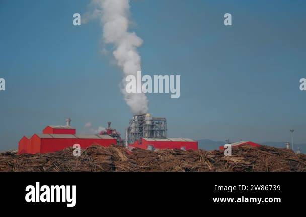 Air pollution of Furniture Factory. Smoke coming from the pipe. Wood ...