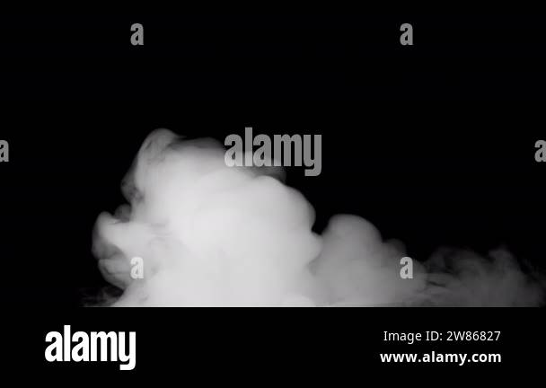 Soft fog in slow motion on dark background. Realistic atmospheric gray ...