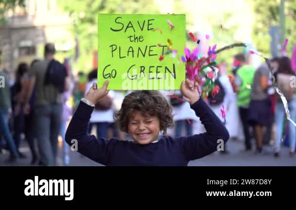 Italia, Milano , Activist boy Child 7 years old with sign Save the ...