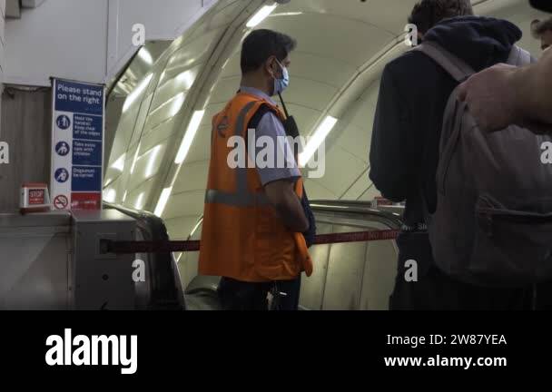 London Underground Staff Stopping People By Escalator Due To Platform ...