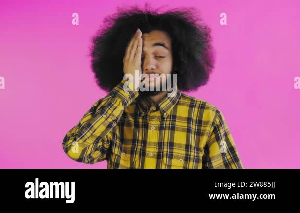 The portrait of a young man making a face gesture, as if there is no, I ...