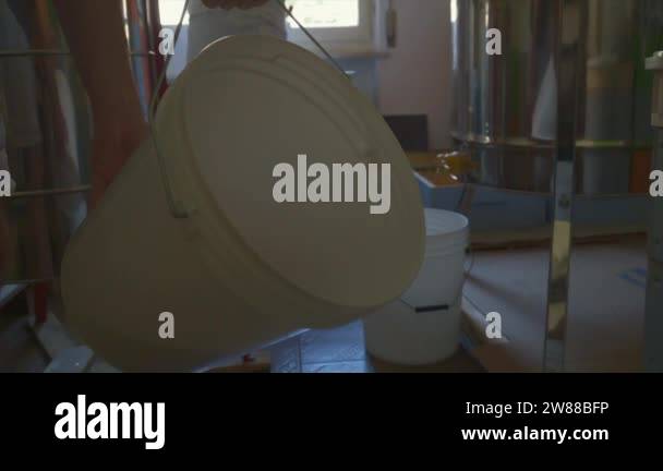 Man pouring bucket Stock Videos & Footage - HD and 4K Video Clips - Alamy