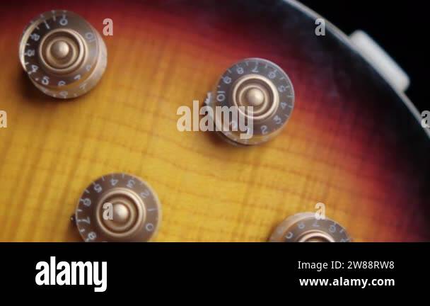 Volume and tone controls of classic wooden-like electric guitar Stock ...