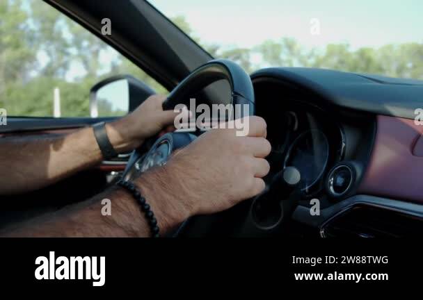 Man hands driving car Stock Videos & Footage - HD and 4K Video Clips ...