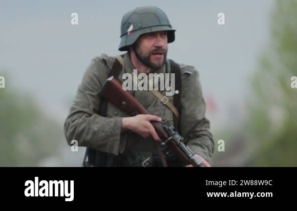Bearded soldier in uniform of Wehrmacht of German army during World War ...