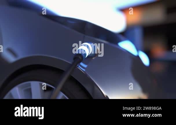 Charging cable is plugged into socket. Electric vehicle charging port ...