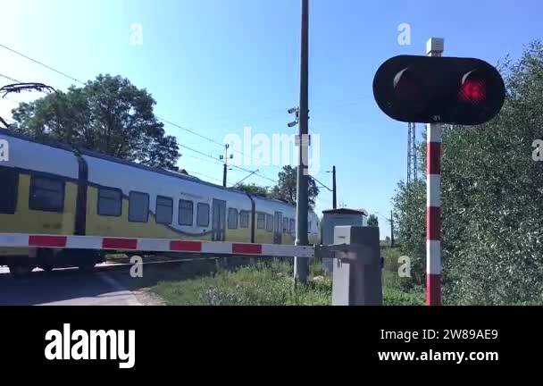 Railroad Level crossing signals, Warning flashing red lights behind ...