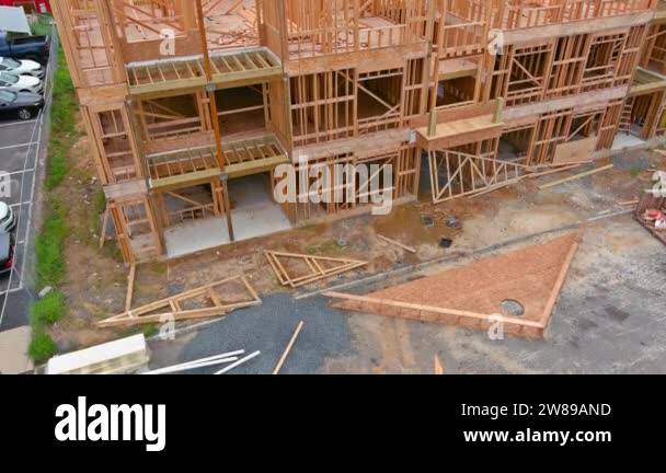 Framing of under construction wooden house building frame structure on ...