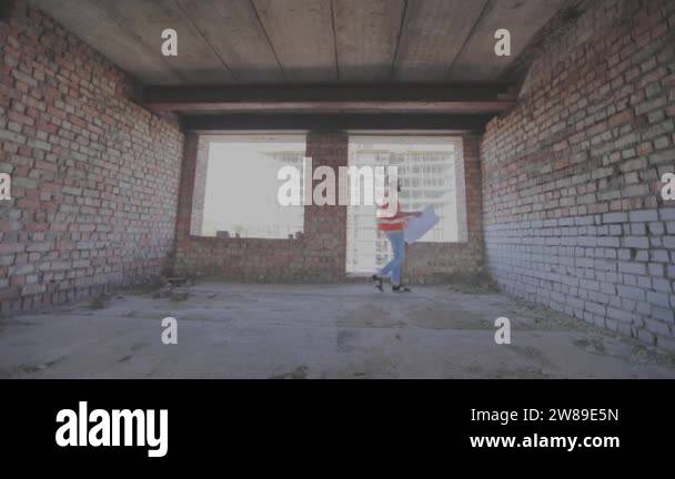 Builders inside a new building. Engineers with a blueprint inside a new ...