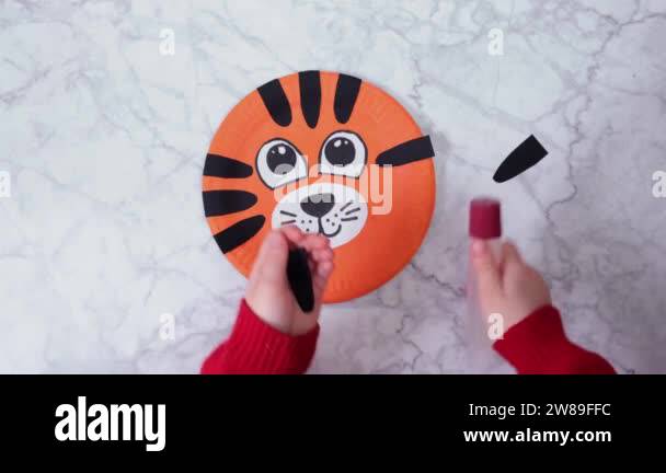 Step by step video instruction: how to make Tiger from Paper Plate ...