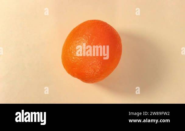 Stop motion animation. The whole orange moves in different directions ...