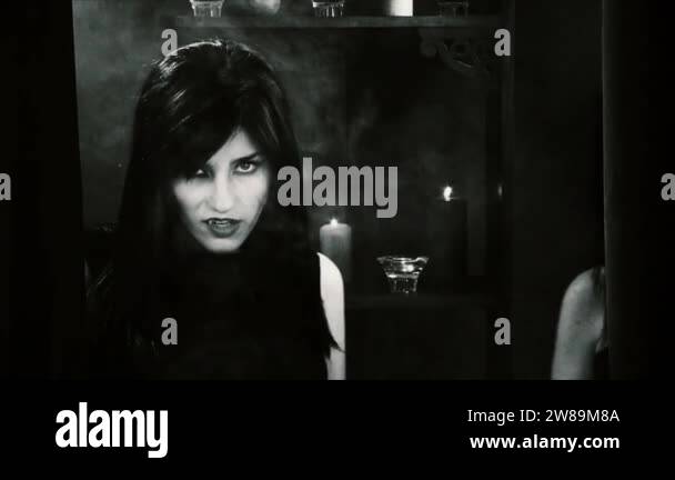 Female vampire fangs Stock Videos & Footage - HD and 4K Video Clips - Alamy