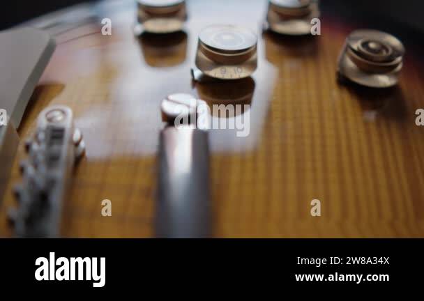 Volume and tone controls of classic wooden-like electric guitar Stock ...