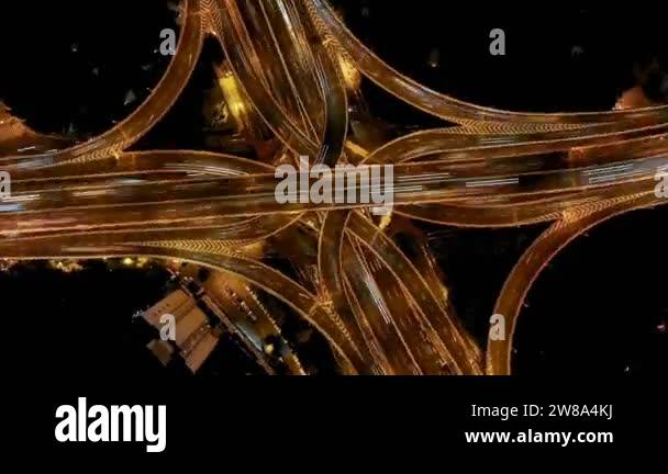 Night highway drone timelapse. Time lapse looking down at freeway ...