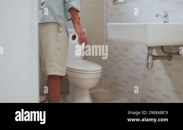 A man feeling his stomach with abdominal pain and use hand open the ...