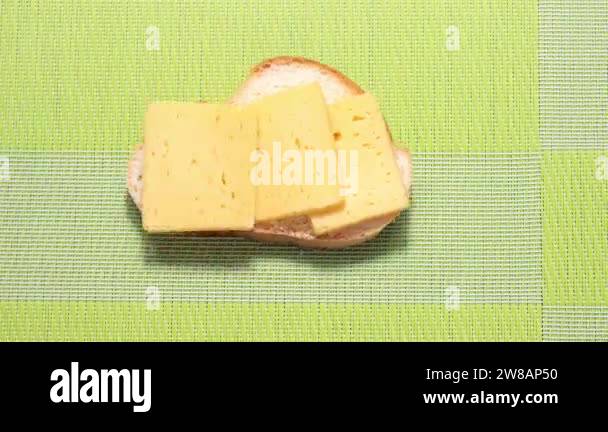 Stop motion animation. A cheese sandwich that bites gradually. A quick ...