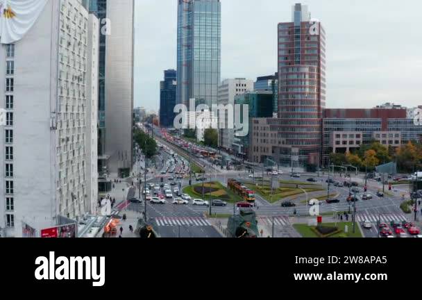 Elevated footage of large roundabout circuit on multilane busy road in ...