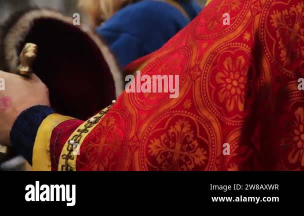 Rich magnate wearing luxury fur clothes, hand of medieval duke holding ...