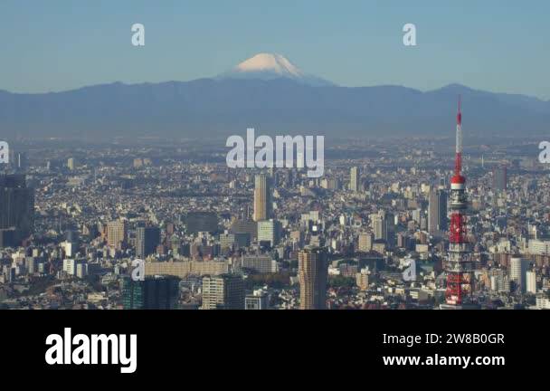 Tokyo, Japan circa-2018. Flying over Tokyo with view of Tokyo Tower and ...