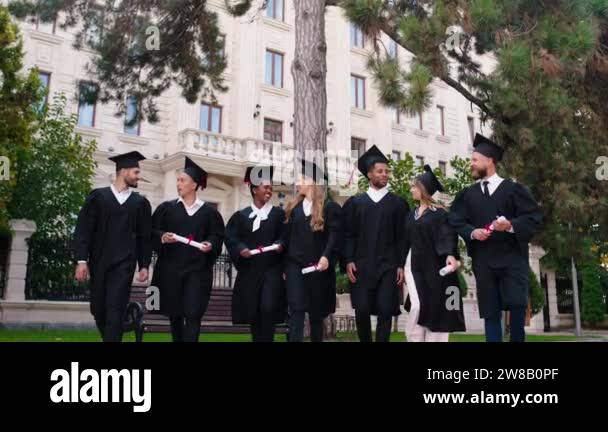 Group of charismatic and beautiful students multiracial graduates in ...