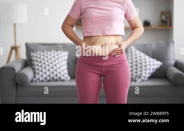 Abdominal massage, tummy tuck and flabby skin on a fat belly, woman ...
