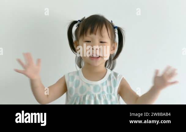 Little girl sing a song Stock Video Footage - Alamy