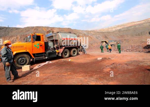 The process of placing explosives in an iron ore quarry. Explosives ...