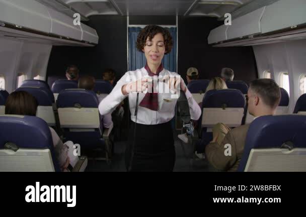 Flight attendant safety demo Stock Videos & Footage - HD and 4K Video ...
