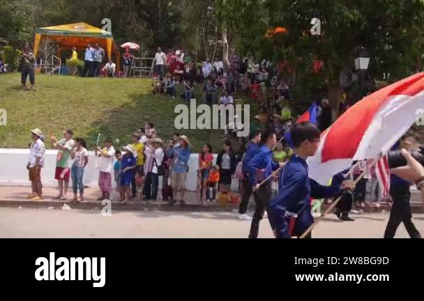 Crowd Watching People With Colorful Flags Marching - Static Stock Video ...
