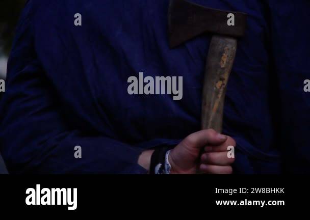 Murderer spying on victim, hiding weapon behind back, attempted ...