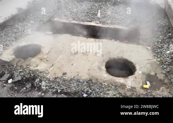 Repair of the heating main. The underground pipe through which steam ...