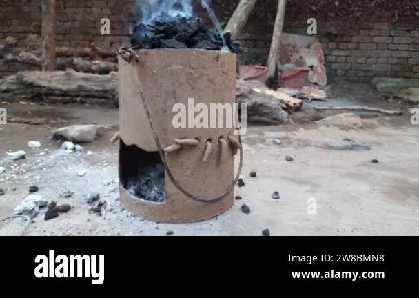 Coal stove india Stock Videos & Footage - HD and 4K Video Clips - Alamy
