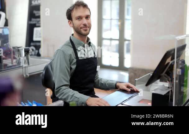 Man cashier in cash Stock Videos & Footage - HD and 4K Video Clips - Alamy