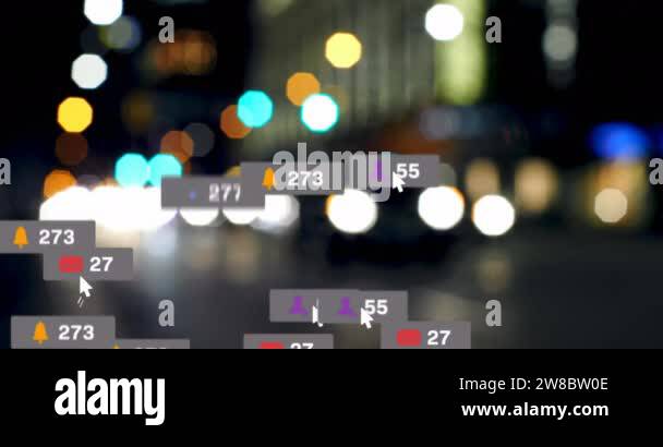 Animation of social media icons and numbers over out of focus traffic lights. global social ...